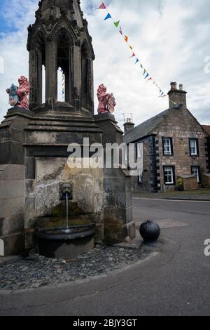 Bruce Fountain with festive colored flags above it, site of famous ...