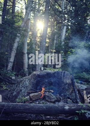 A morning campfire Stock Photo - Alamy