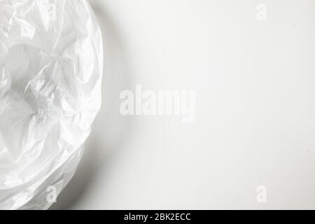 Squeeze a crumpled foam sheet isolated on white background with copy ...