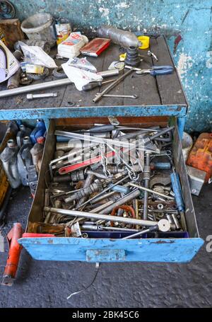 Bunch of messy tools in the garage Stock Photo - Alamy