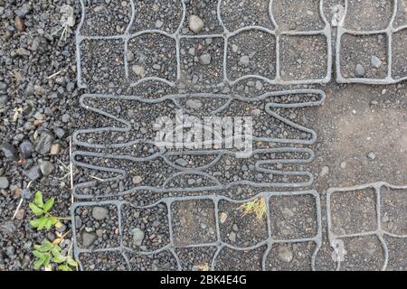 Detail showing path/ground reinforcement grid with separators on the ...