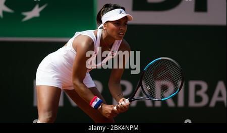 Tessah Andrianjafitrimo of France in action against Karolina Pliskova ...