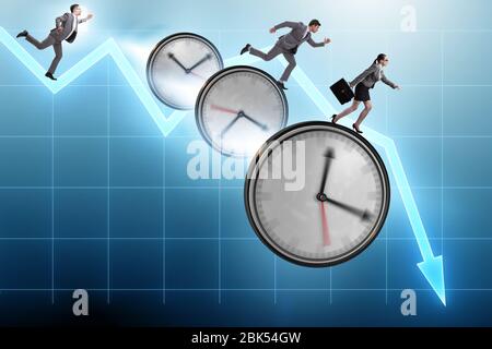 The concept of the recession and decline with time clocks Stock Photo ...