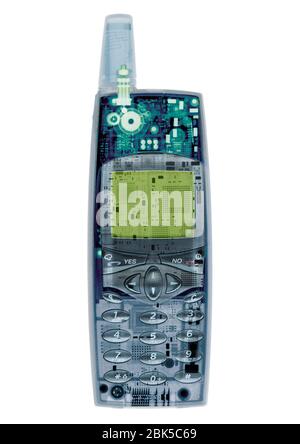 Mobile phone, coloured X-ray Stock Photo - Alamy