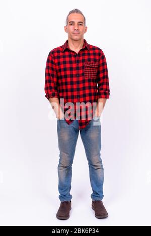 Full body shot of Persian hipster man pointing up Stock Photo - Alamy
