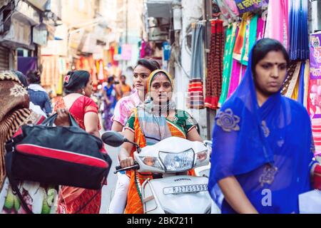 Udaipur city in India, February 8, 2018: People walking in Udaipur ...