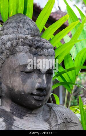 Buddhist statue at stonemasons workshop Bali Indonesia Stock Photo - Alamy