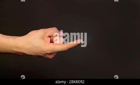man beckoning come here gesture with hand Stock Photo - Alamy