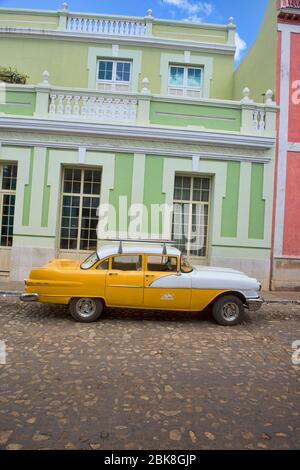 Old Classic Chevy on cobblestone street of Trinidad Cuba Stock Photo ...