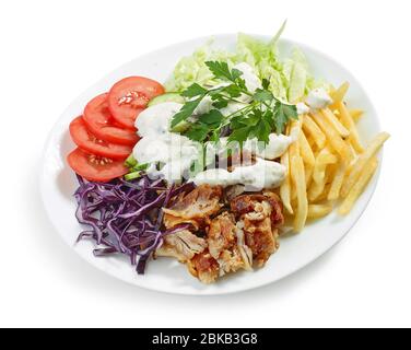 Gyros on the plate with vegetables Stock Photo - Alamy