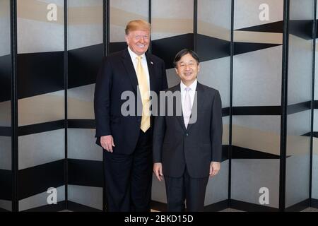 Japan's Emperor Naruhito and Empress Masako speak with Japanese ...