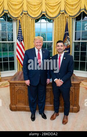 President Donald Trump attends the swearing-in ceremony for Ambassador ...