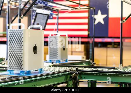 Apple Computer towers are seen on the assembly line at the Apple ...