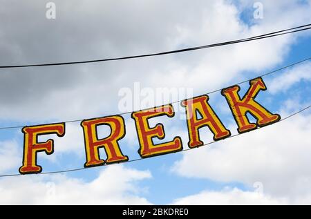 freak - yellow signs with blue sky Stock Photo - Alamy