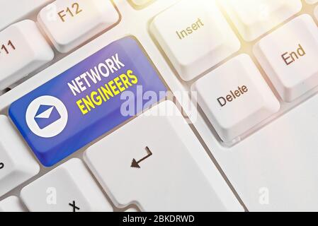 Handwriting text writing Network Engineers. Conceptual photo Technology professional Skilled in ...