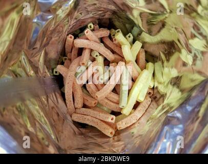 Vegetable straw chips inside the snack bag Stock Photo - Alamy