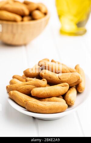 Mini bread sticks on plate Stock Photo - Alamy