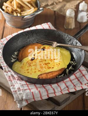 Parmo. Breaded chicken with béchamel sauce and melted cheese. North ...