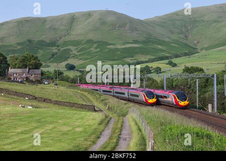 Virgin Trains Class 390 Pendolinos with 'Flowing Silk' livery, standing ...