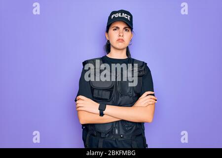 Grumpy looking police officer isolated on white background Stock Photo ...