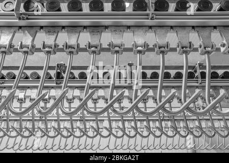 Meat hanging hook.Industrial loading dock area inside cold storage ...