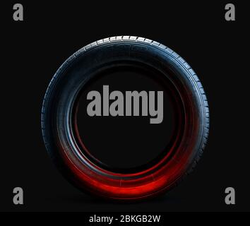 Brand new modern car tyre on a black background. Studio shot Stock ...