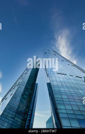 A low angle shot of tall buildings in the city Stock Photo - Alamy