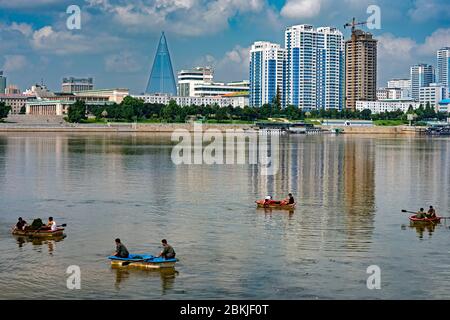 North Korea, Pyongyang, cleaning up the seaweed from the Daidong river ...