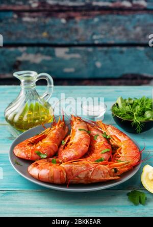 A closeup shot of cooked tiger prawns in a bowl Stock Photo - Alamy