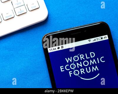 The logo of the World Economy Forum is displayed on a window at the ...