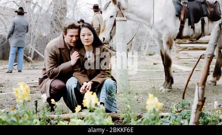 THOUSAND PIECES OF GOLD, from left: Dennis Dun, Rosalind Chao, 1990 ...