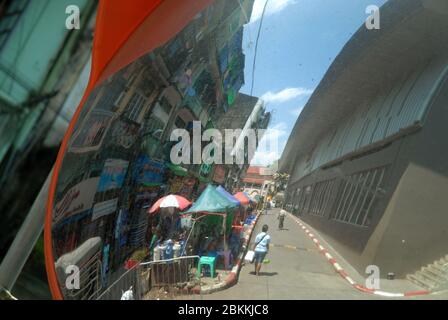 Reflection of market in a mirror, Yangon, Myanmar, Asia Stock Photo - Alamy
