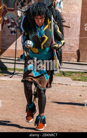 A photograph of a traditional Buffalo Dance performed in front of the ...