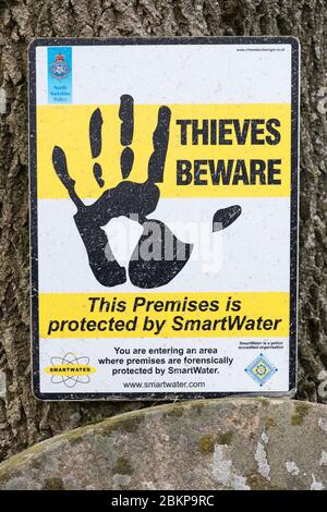 Smart water thieves beware logo sticker Stock Photo - Alamy