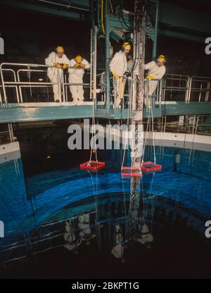 SCRIBA, NEW YORK, USA, 1985 - Technicians at work during refueling of ...