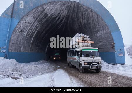 Salang Pass, Afghanistan - January 2015: Trucks pass through the Salang ...