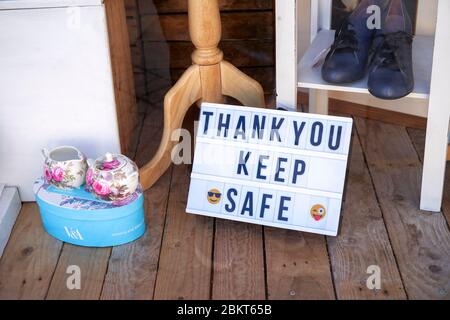 Thank you keep safe message with emojis in shop window Stock Photo - Alamy