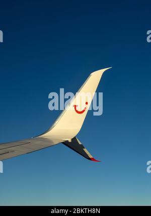 Curved wing tip of a TUI holiday jet Stock Photo - Alamy