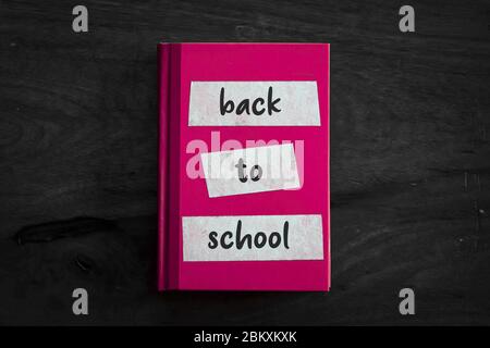 A pink book with three simple words Stock Photo - Alamy