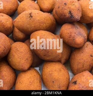 Deep fried kibbeh of ground beef meat mixed with bulgur, stuffed with ...