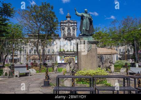 Building and statue at the University of Santo Tomas, in Sampaloc ...