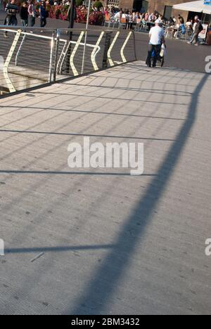 The floating pedestrian bridge at West India Quay, Canary Wharf, is a ...