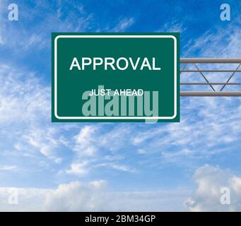 Approval road sign on sky background Stock Photo - Alamy