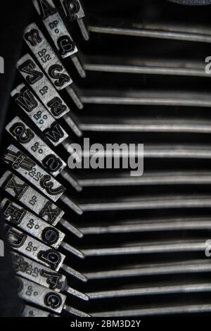 Mechanical hammers with alphabet for typing old typewriter Stock Photo ...