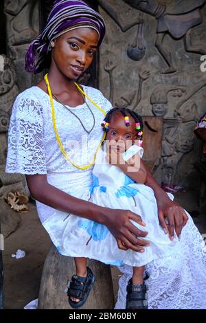 Osun Osogbo: Women in Traditional Attire sitting inside Osun Grove ...