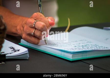 wedding guest signing book journal Stock Photo - Alamy