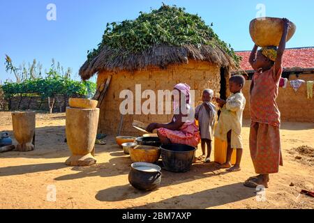 Rural African family doing housework in a remote Nigerian village Stock ...