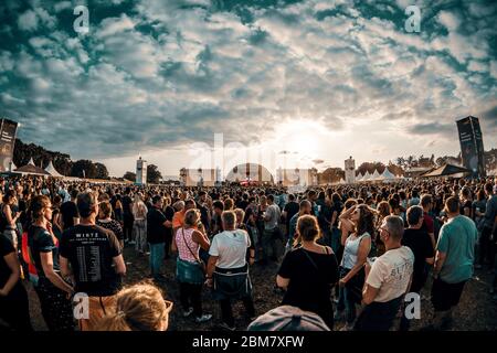 festival crowd with cloudy sky Stock Photo - Alamy