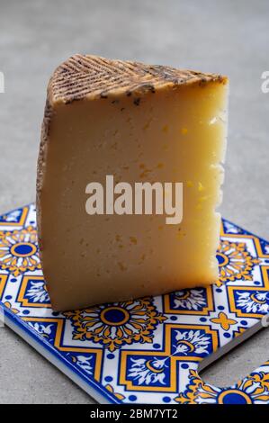 Spanish cheese manchego made from sheep milk close up Stock Photo - Alamy