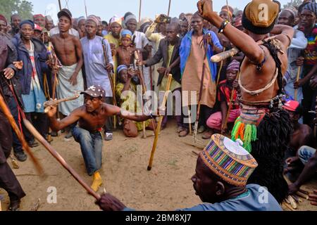 Young Fulani men fighting in a Sharo festival. Sharo is a Fulani ...